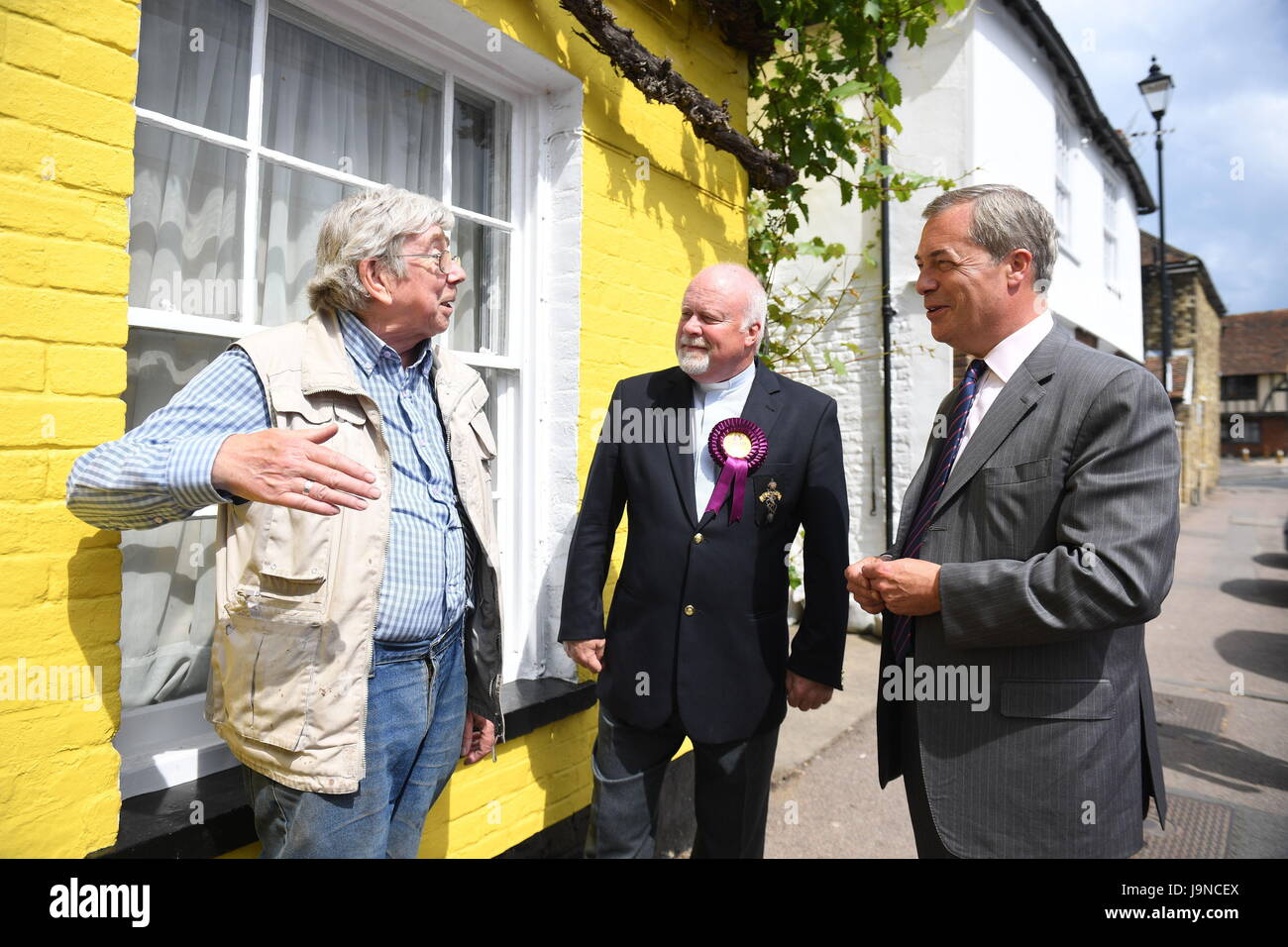 Former Ukip leader Nigel Farage (right) and the party's local candidate ...