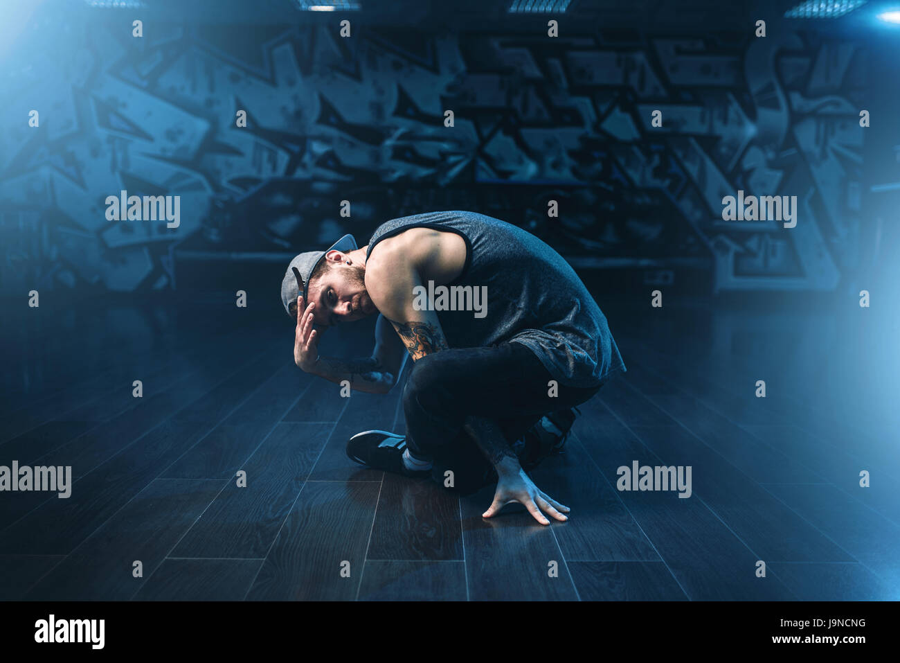 Breakdance performer posing in dance studio. Modern urban dancing style Stock Photo - Alamy