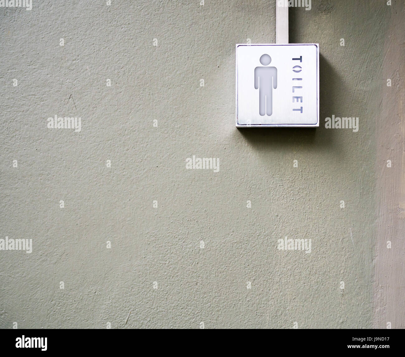Men toilet sign on wall, silver and modern restroom with copy space ...