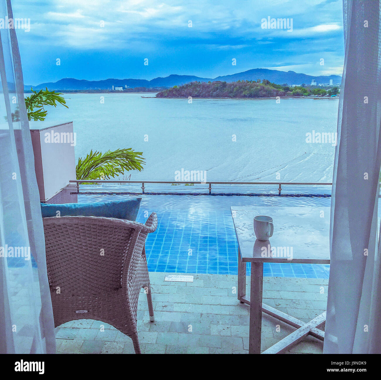 a view from the hotel room on the infinity pool and the ocean Stock ...