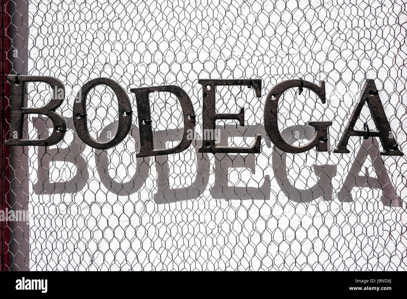 Wrought iron sign outside bodega bar in Spain Stock Photo - Alamy