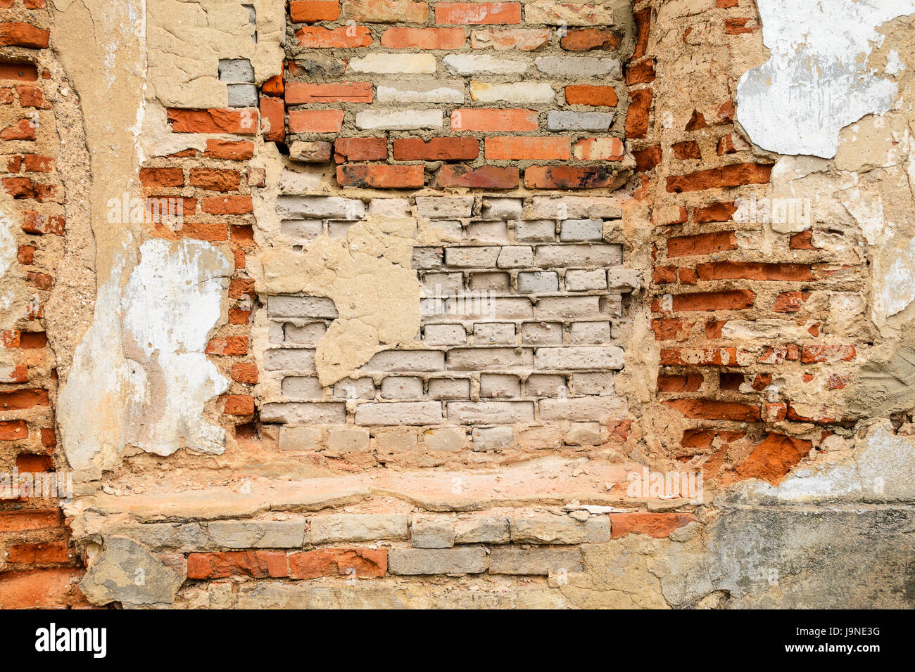 Brick wall texture shattered by time. Grunge background Stock Photo - Alamy