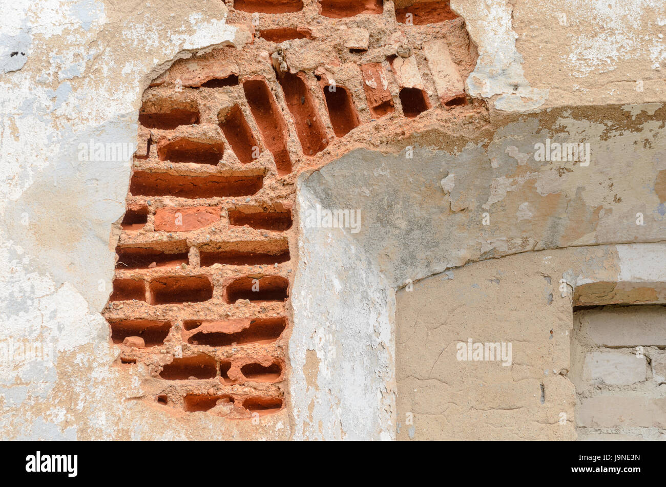 The facade of the old brick building collapses time and weather Stock ...