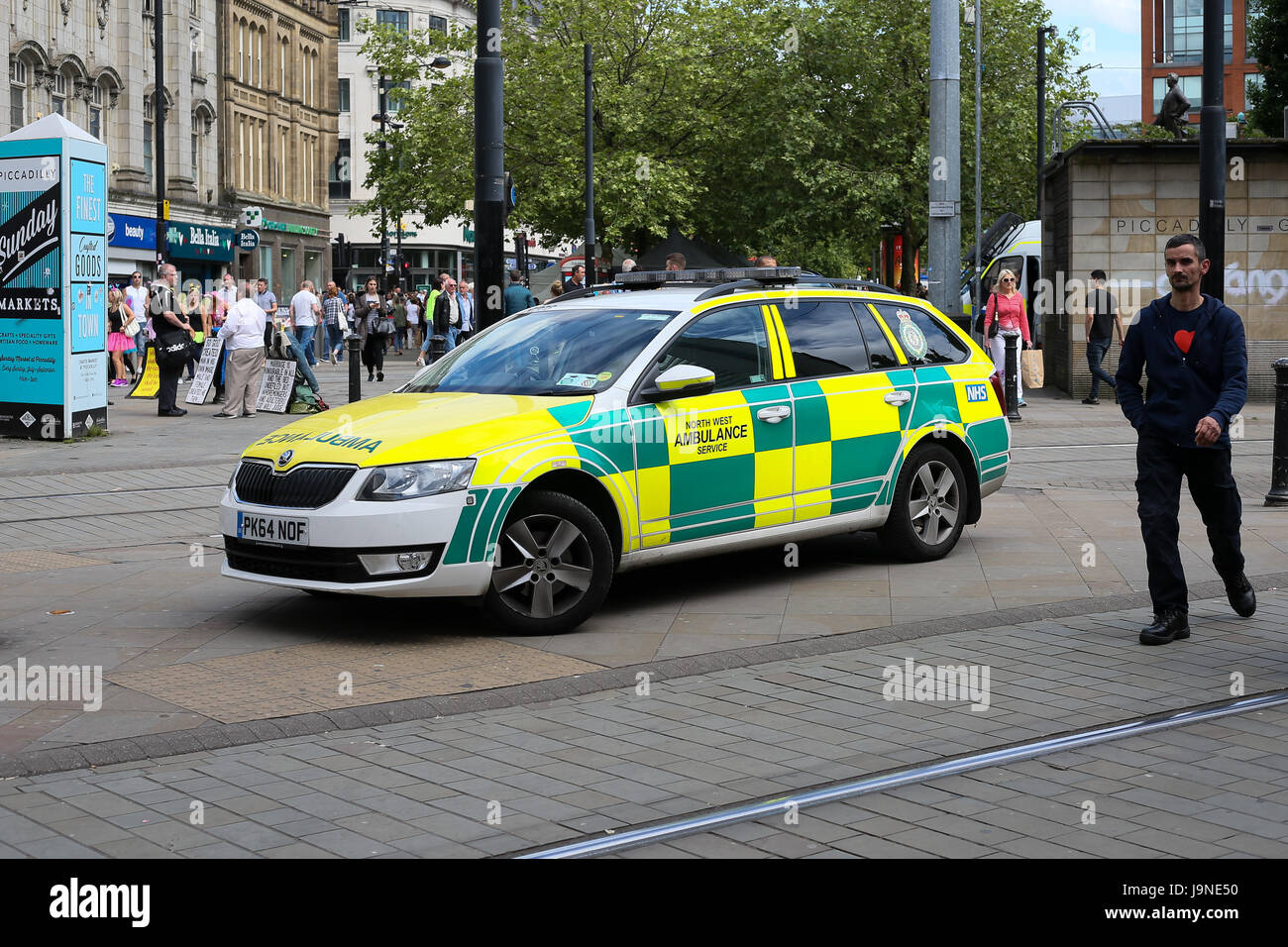 Ambulance in Manchester City Centre Stock Photo - Alamy