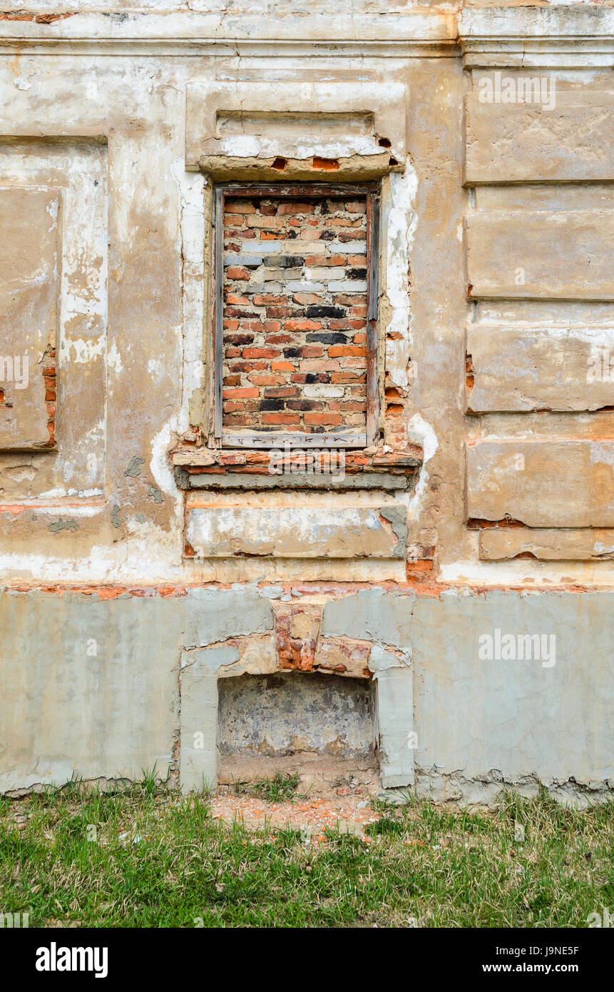 The facade of the old brick building collapses time and weather Stock ...