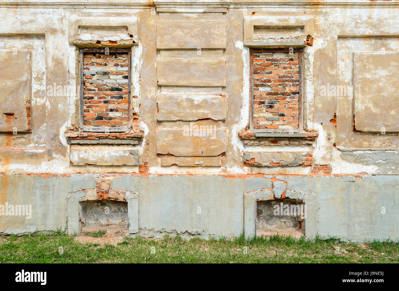 The facade of the old brick building collapses time and weather Stock ...