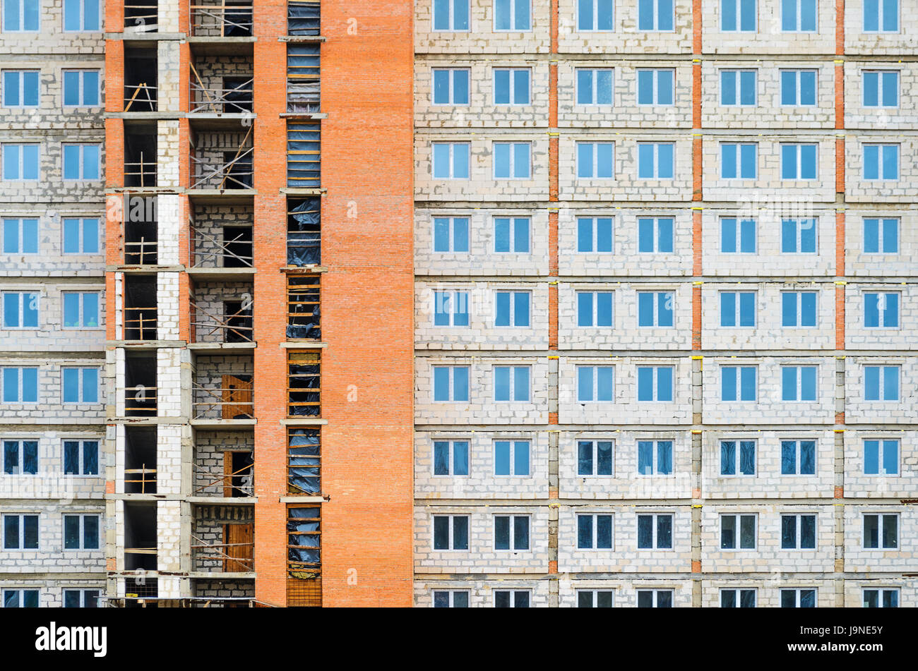 Facade of a multi-storey residential building under construction Stock ...
