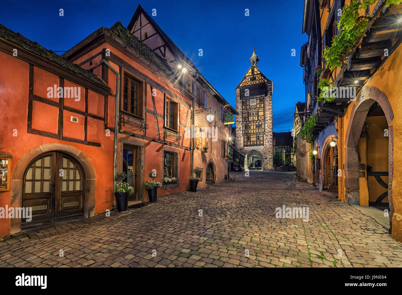 Evening street with Dolder Tower and traditional colorful half-timbered ...