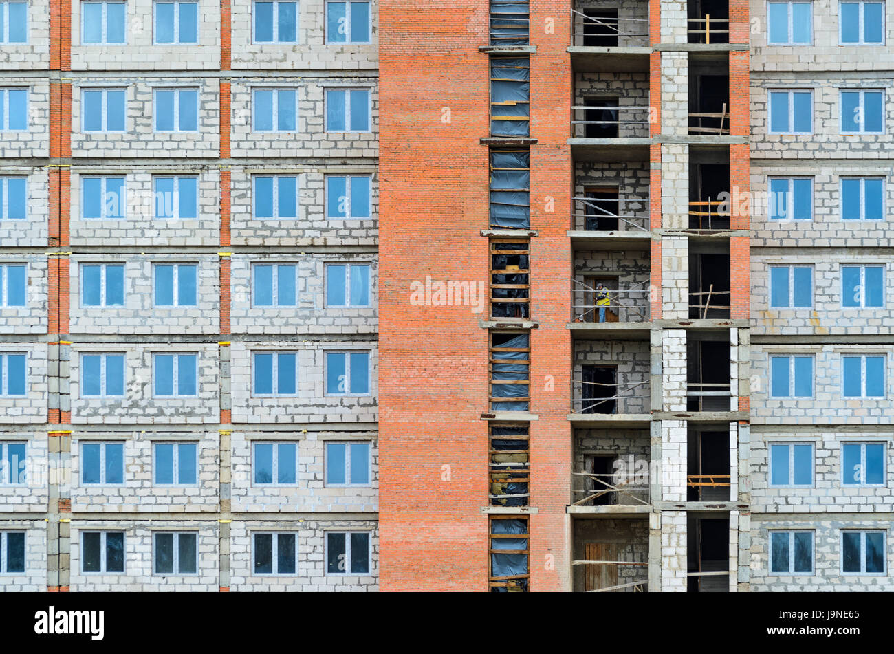 Facade of a multi-storey residential building under construction Stock ...