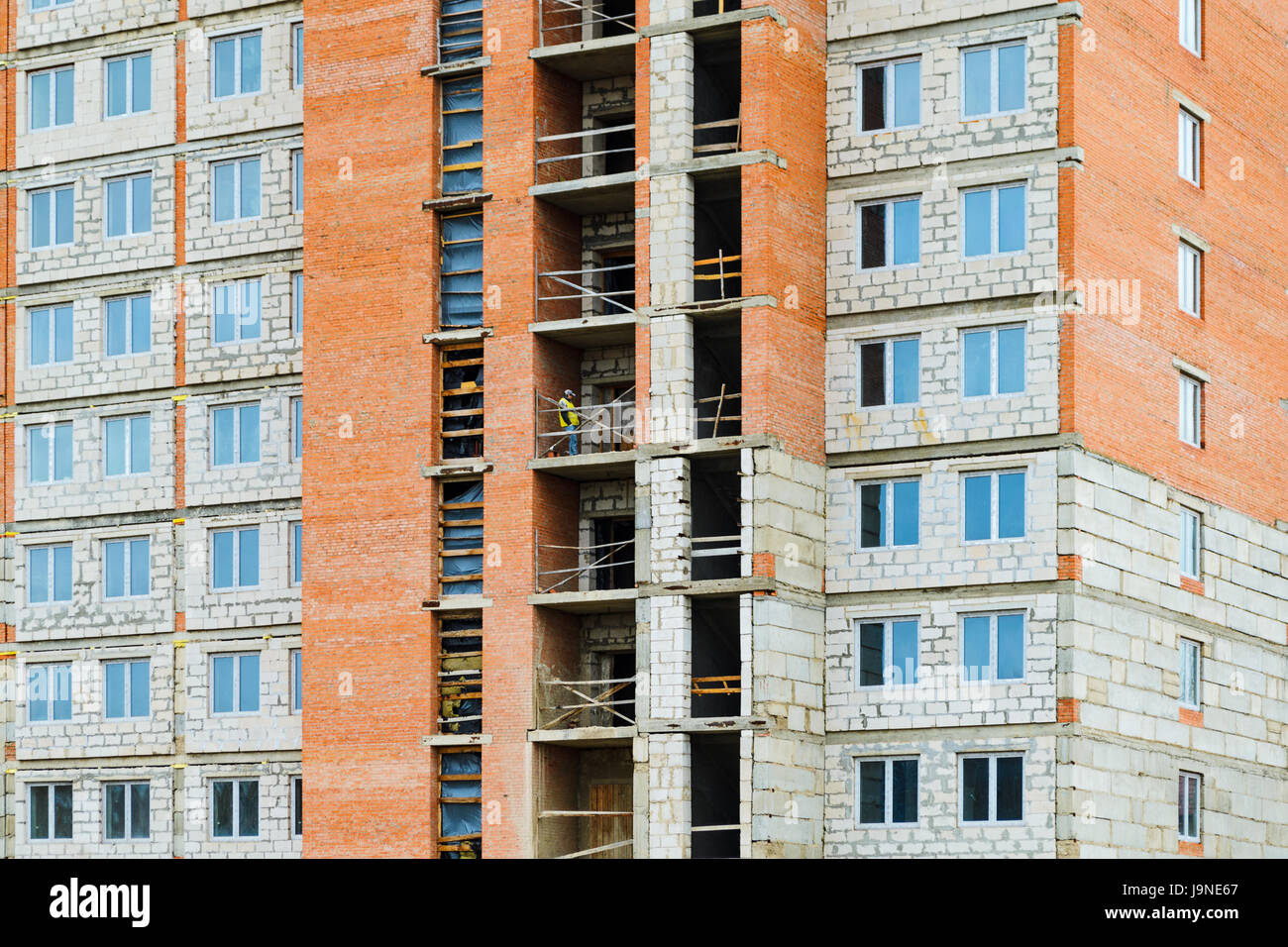 Facade of a multi-storey residential building under construction Stock ...