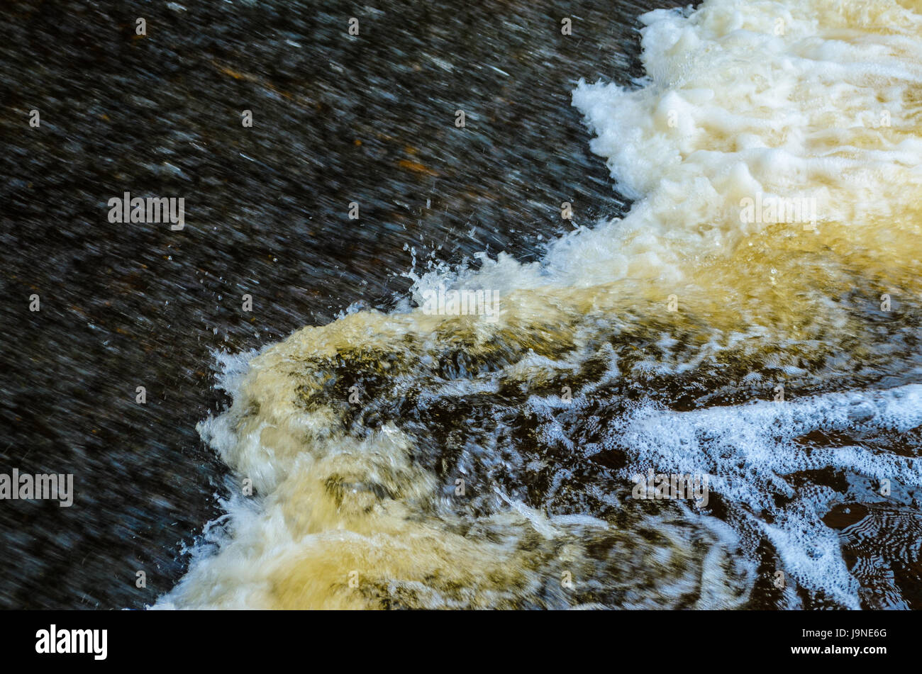River in motion nature background. Foaming water on the rapids of the ...