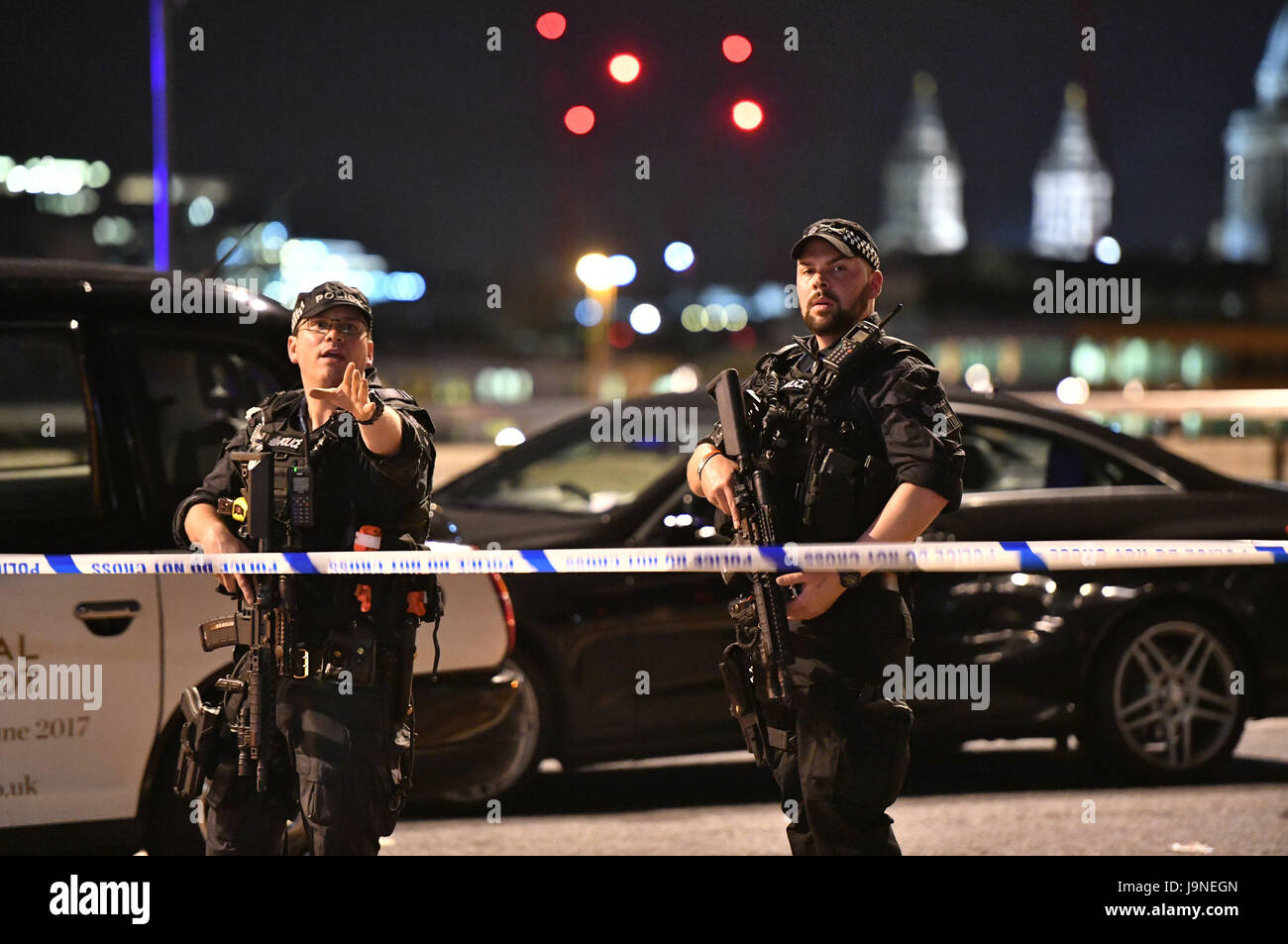 Armed Police officers on London Bridge as police are dealing with a ...