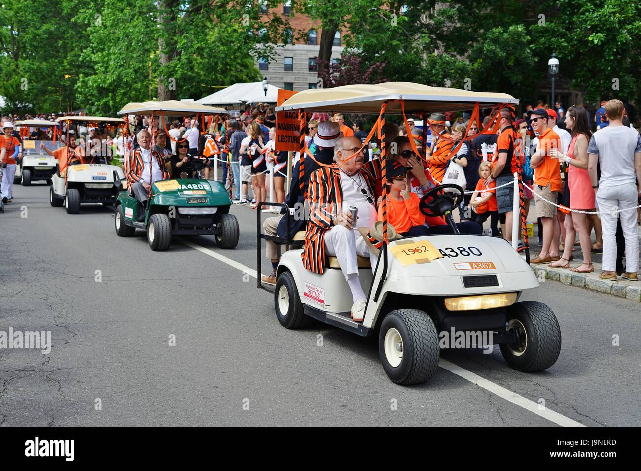 Princeton University alumni dressed in orange and black march joyously ...