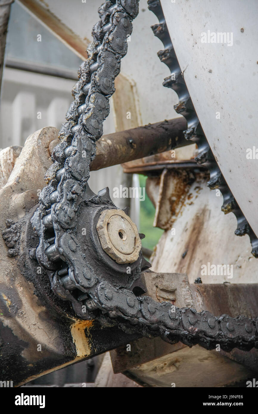 old chain with grease on propel roller for motor powered Stock Photo ...