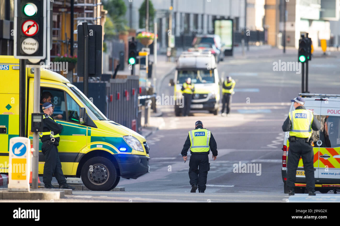 Police on Southwark Bridge Road, London, near the scene of last night's ...