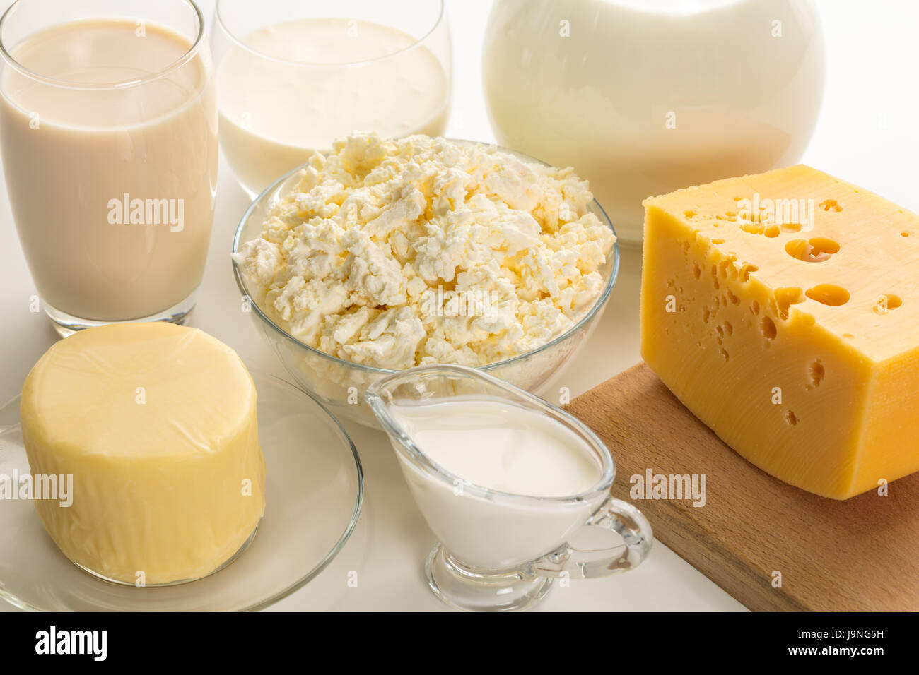 still life of dairy products on white background Stock Photo - Alamy