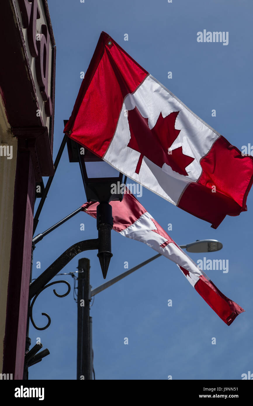 Canadian Flag in Cityscape Stock Photo - Alamy