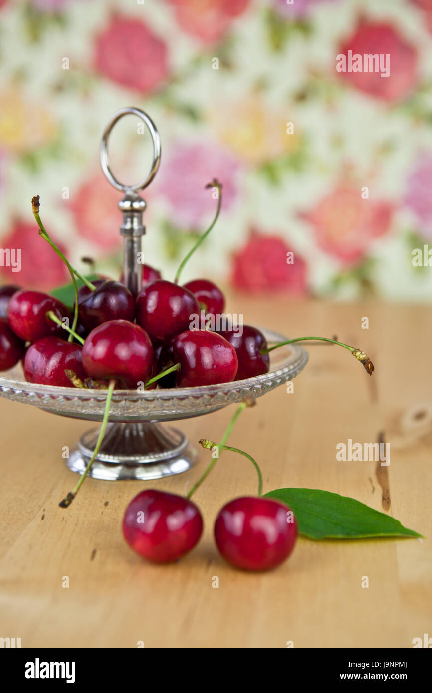 cherries on a cake stand Stock Photo - Alamy