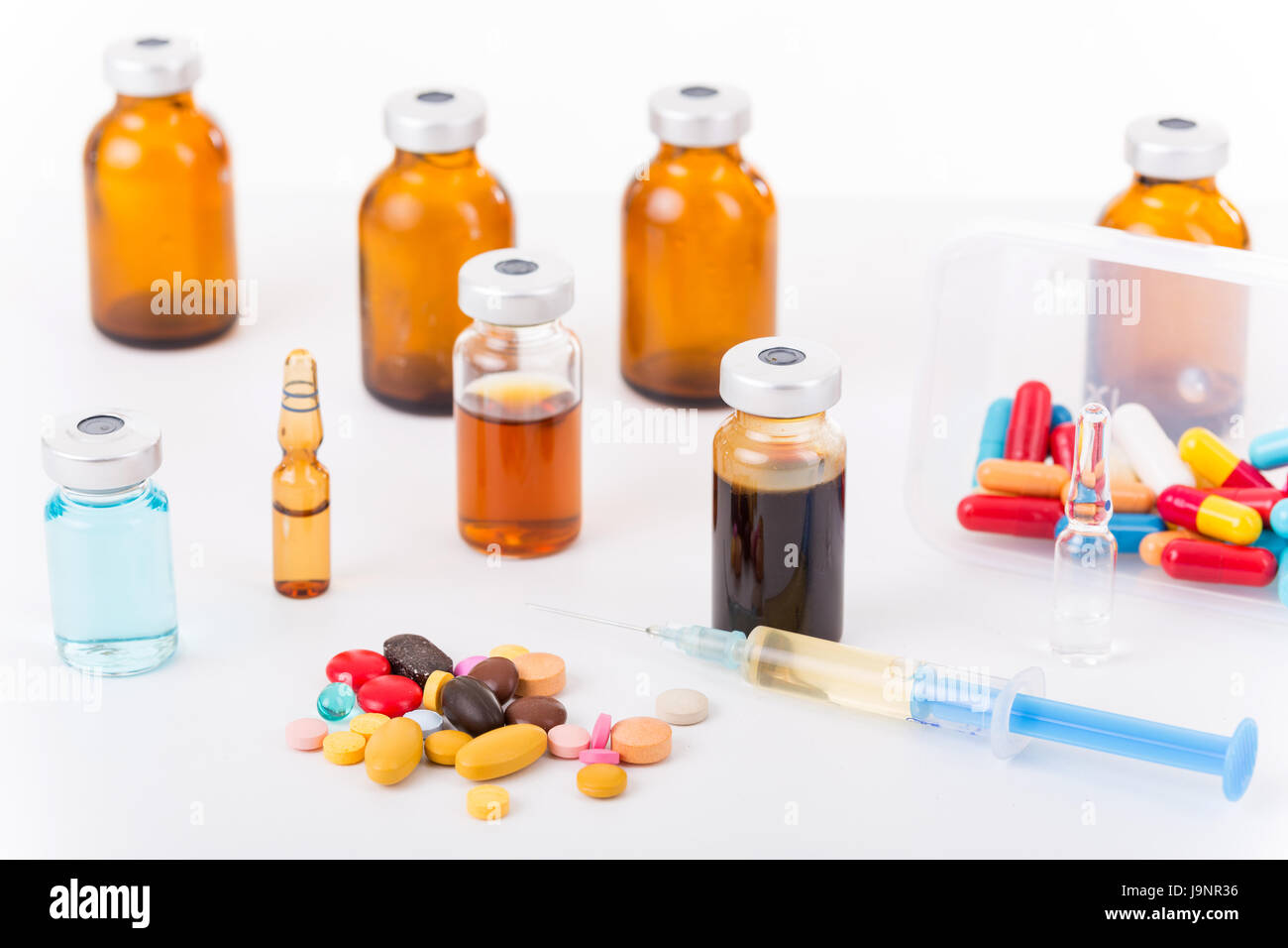 Different types of drugs on white background Stock Photo - Alamy