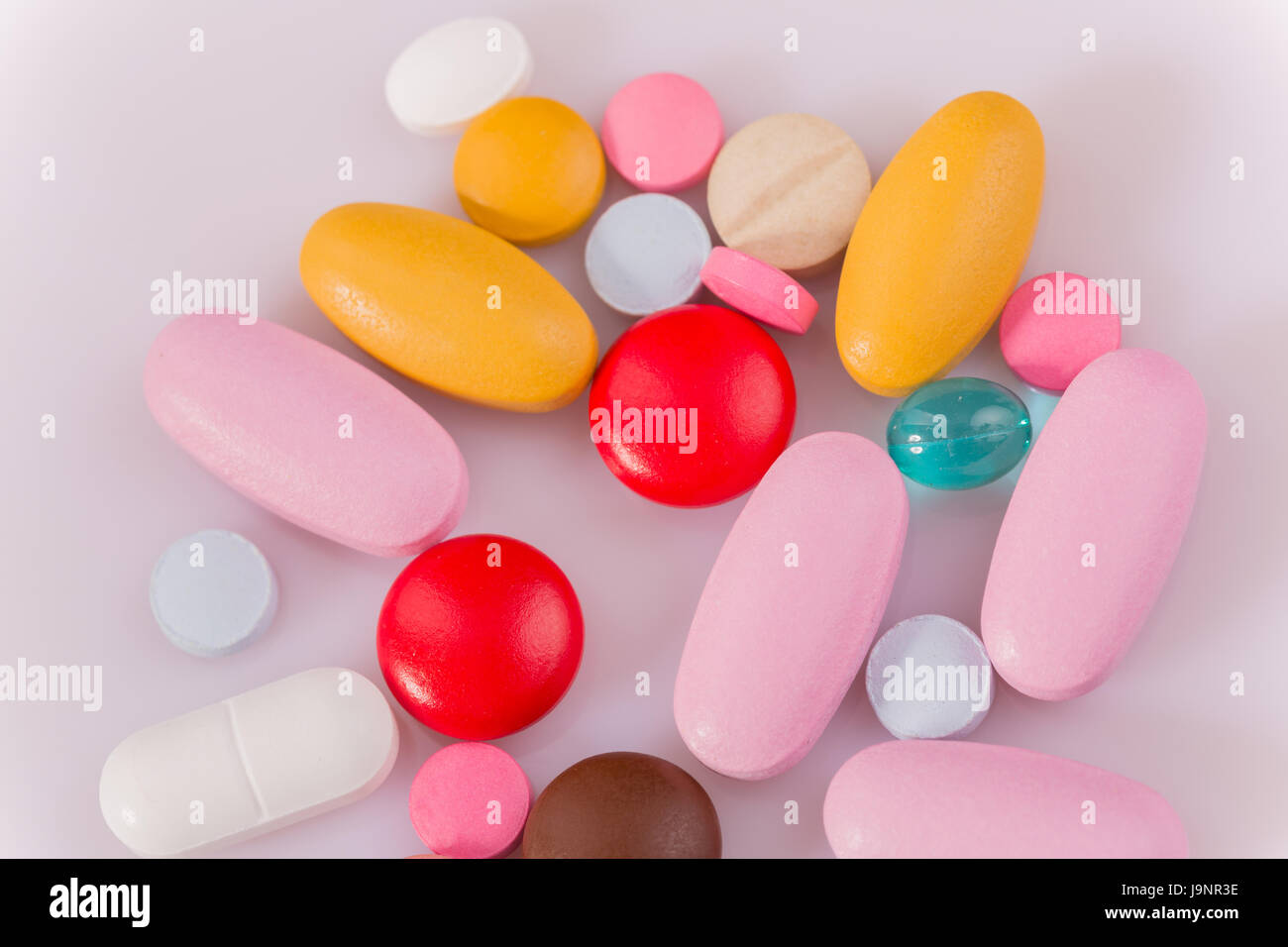 different Tablets pills capsule heap mix therapy drugs Stock Photo - Alamy