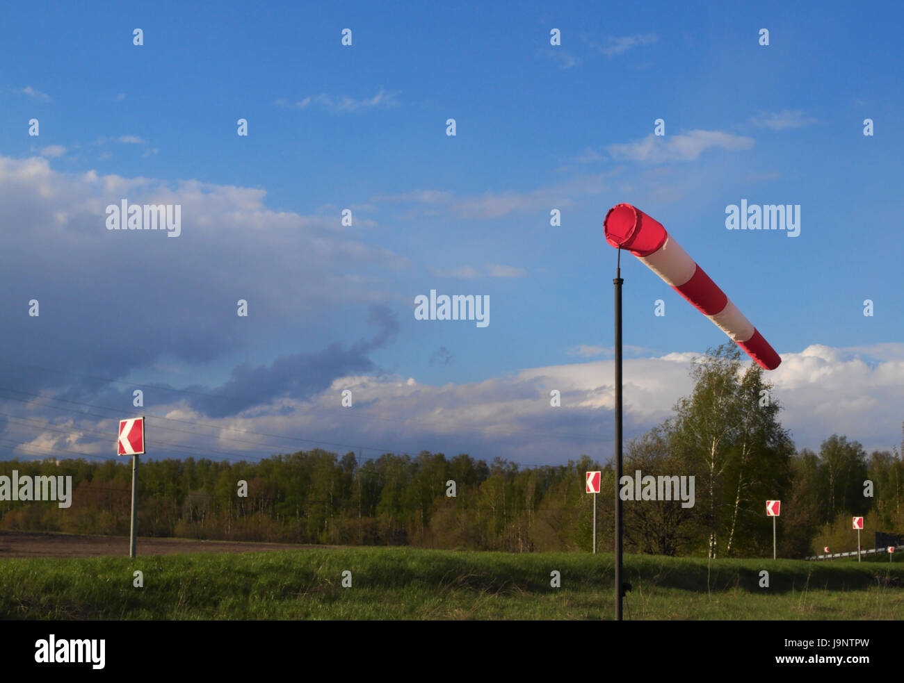 Wind cone with road signs Stock Photo - Alamy