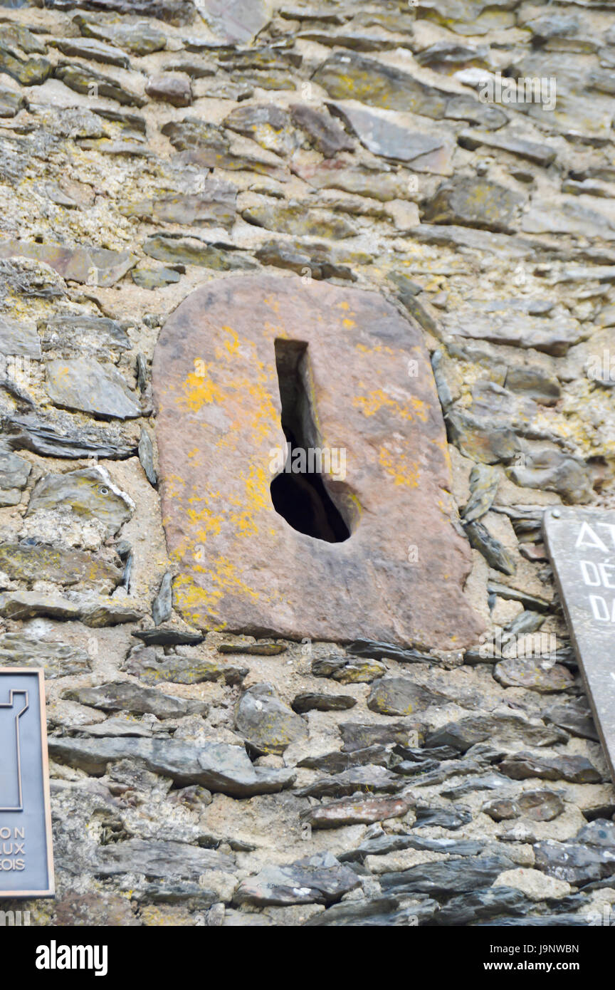 Huge iron lock encrusted in a stone wall of the portico at the castle ...