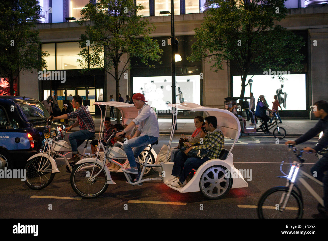 London rickshaw cyclists Stock Photo - Alamy