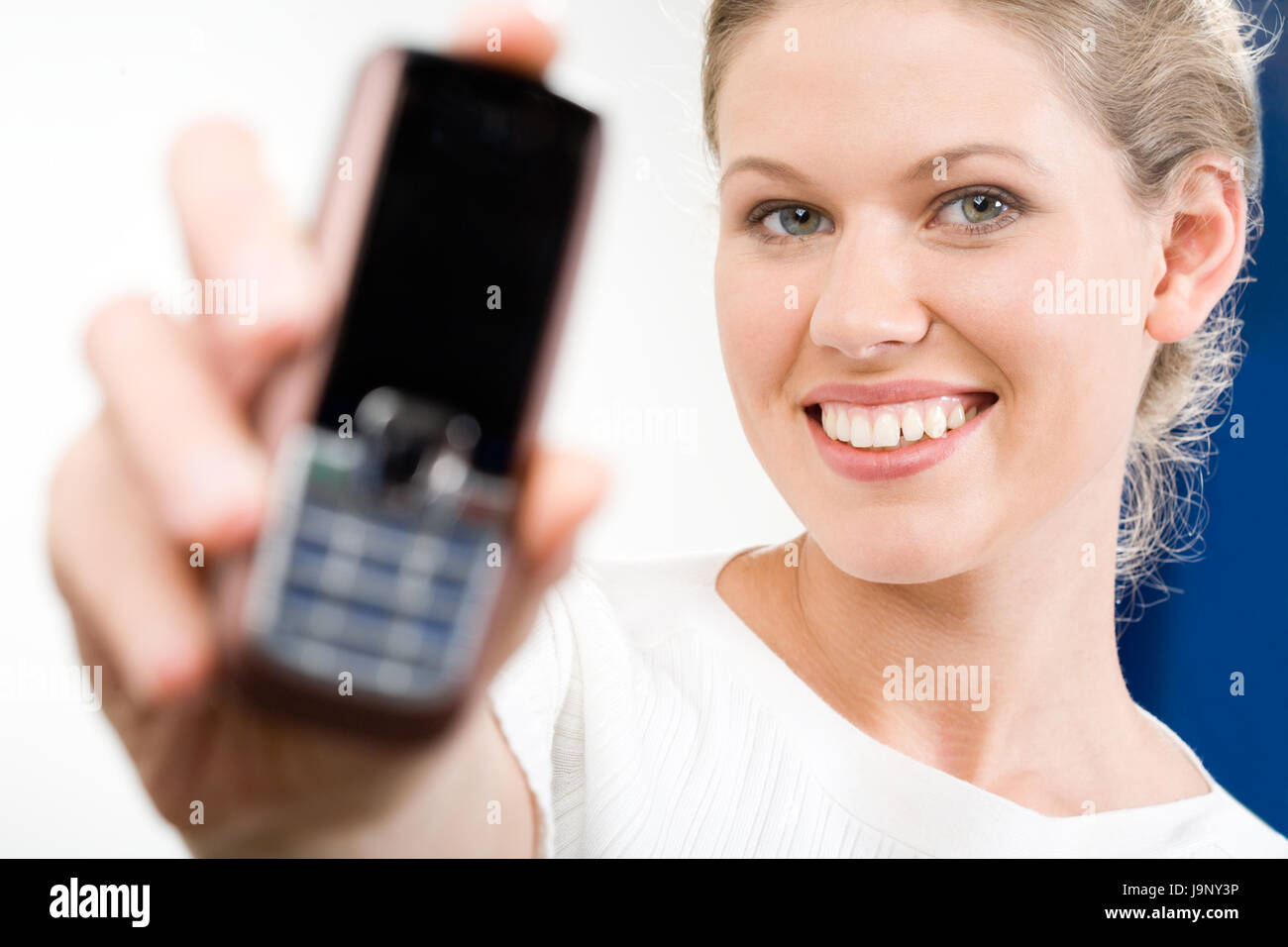Hand holding phone showing alert hi-res stock photography and images ...