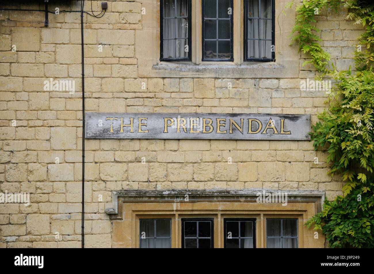 The Prebendal, Thame, Oxfordshire. A path through the churchyard leads ...