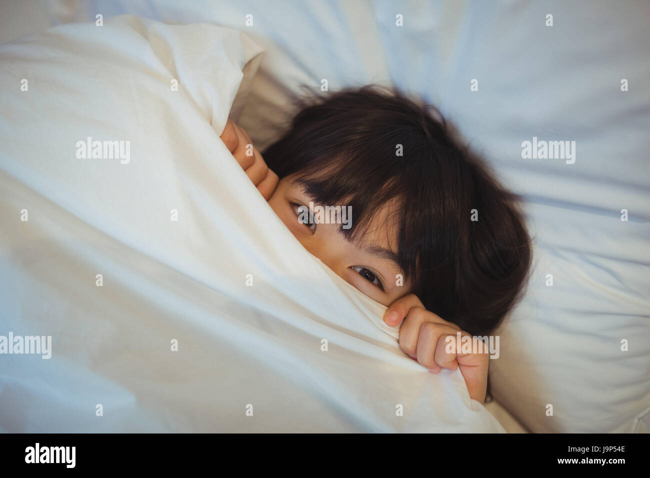 Child hide under bed hi-res stock photography and images - Alamy