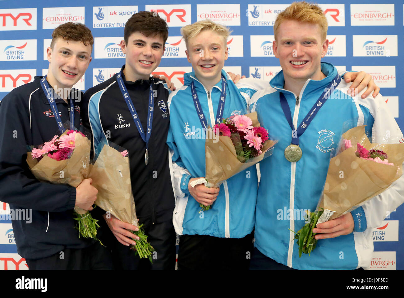 On the podium for the Men's 10m Synchro is (from left) Noah Williams ...