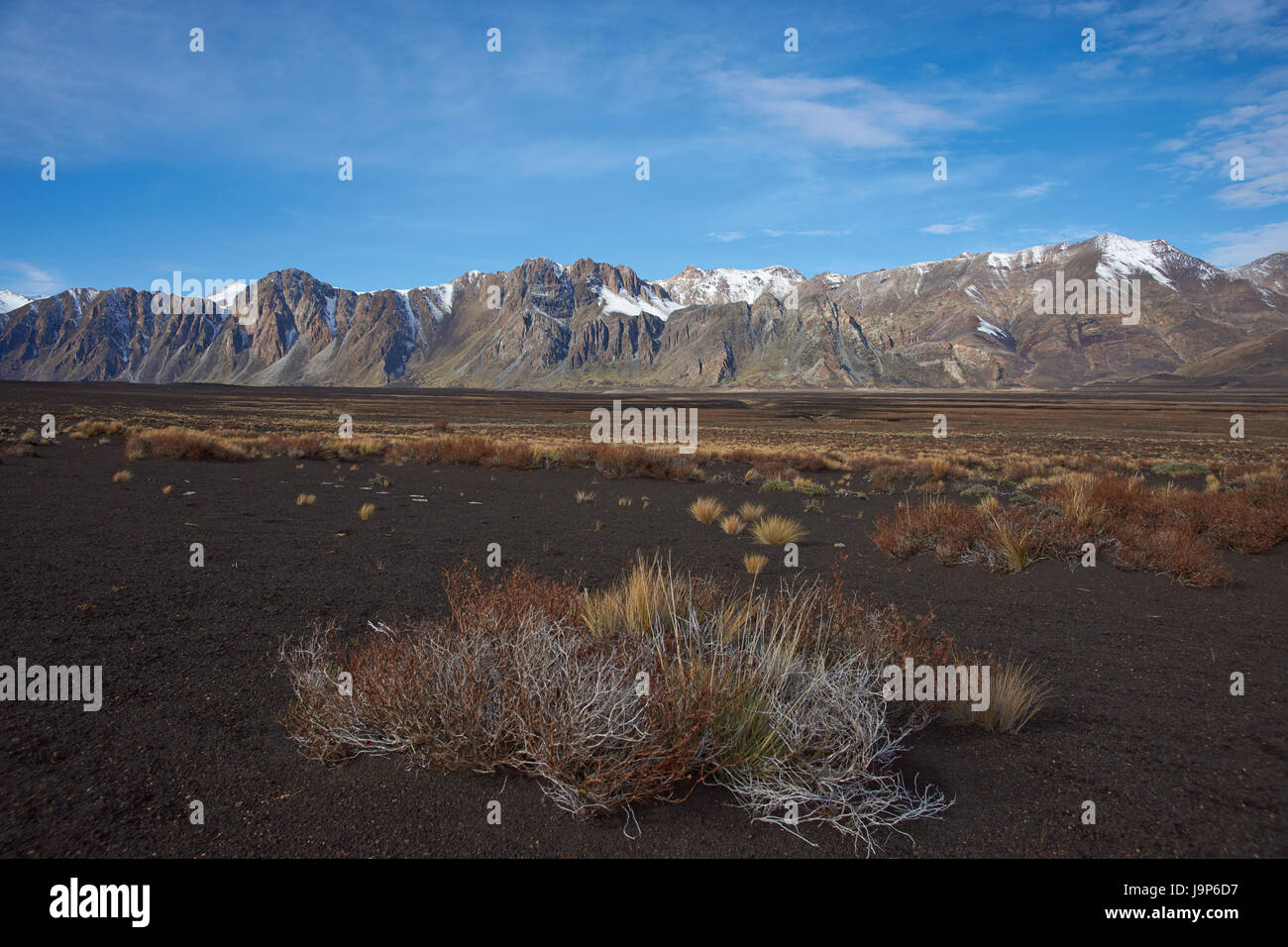Volcanic plain, high in the mountains of Laguna de Laja National Park ...