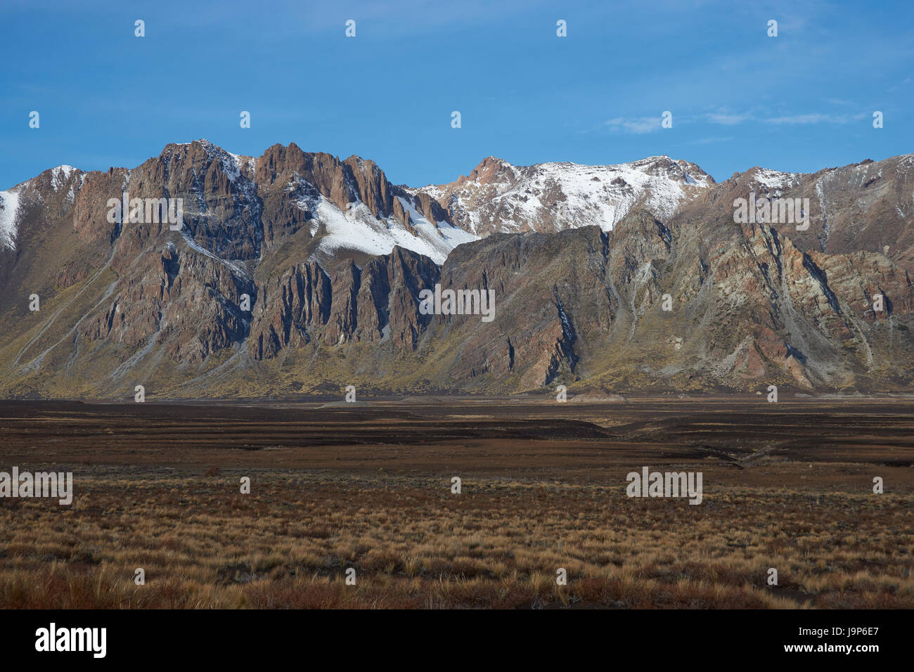Volcanic plain, high in the mountains of Laguna de Laja National Park ...