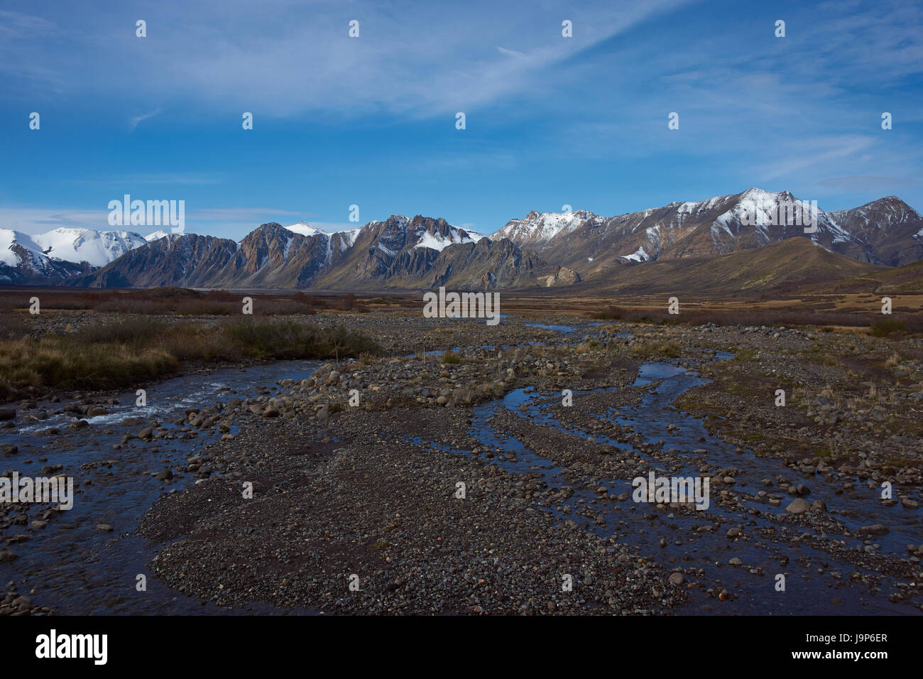 Mountain river flowing into Laguna de Laja in Laguna de Laja National ...