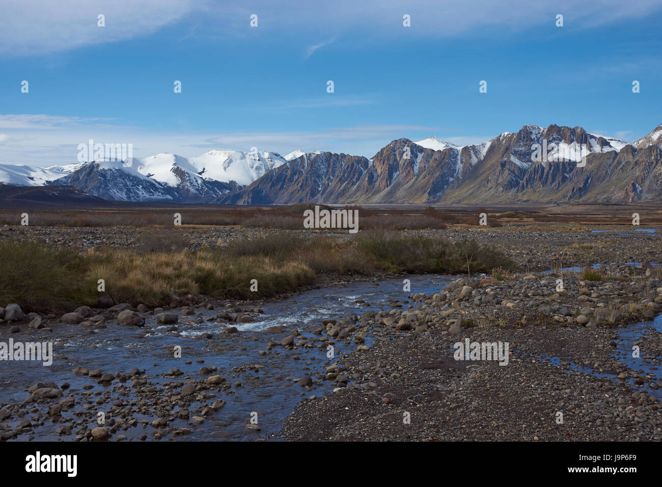 Mountain river flowing into Laguna de Laja in Laguna de Laja National ...