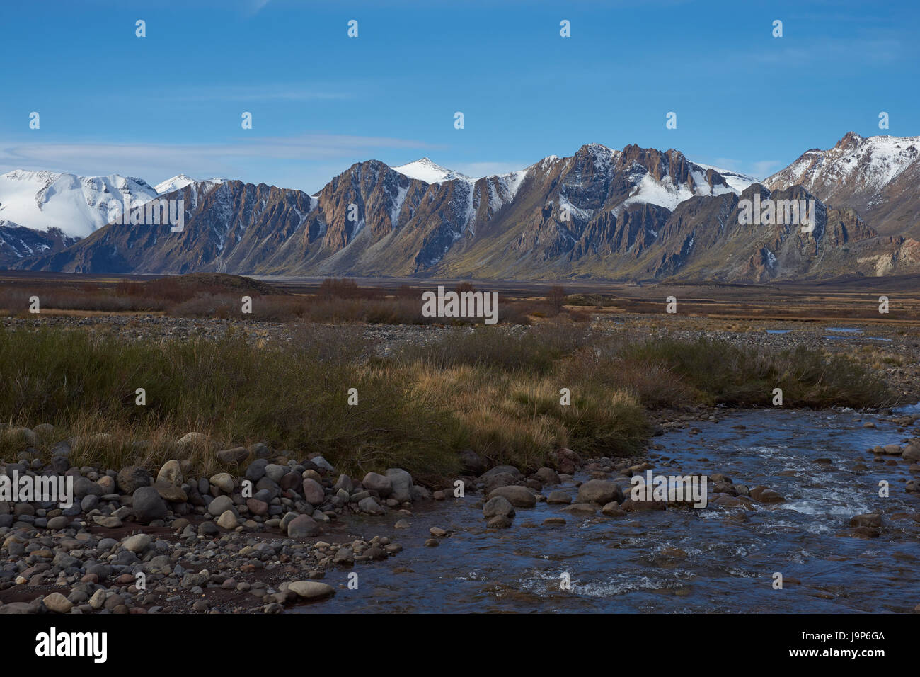 Mountain river flowing into Laguna de Laja in Laguna de Laja National ...