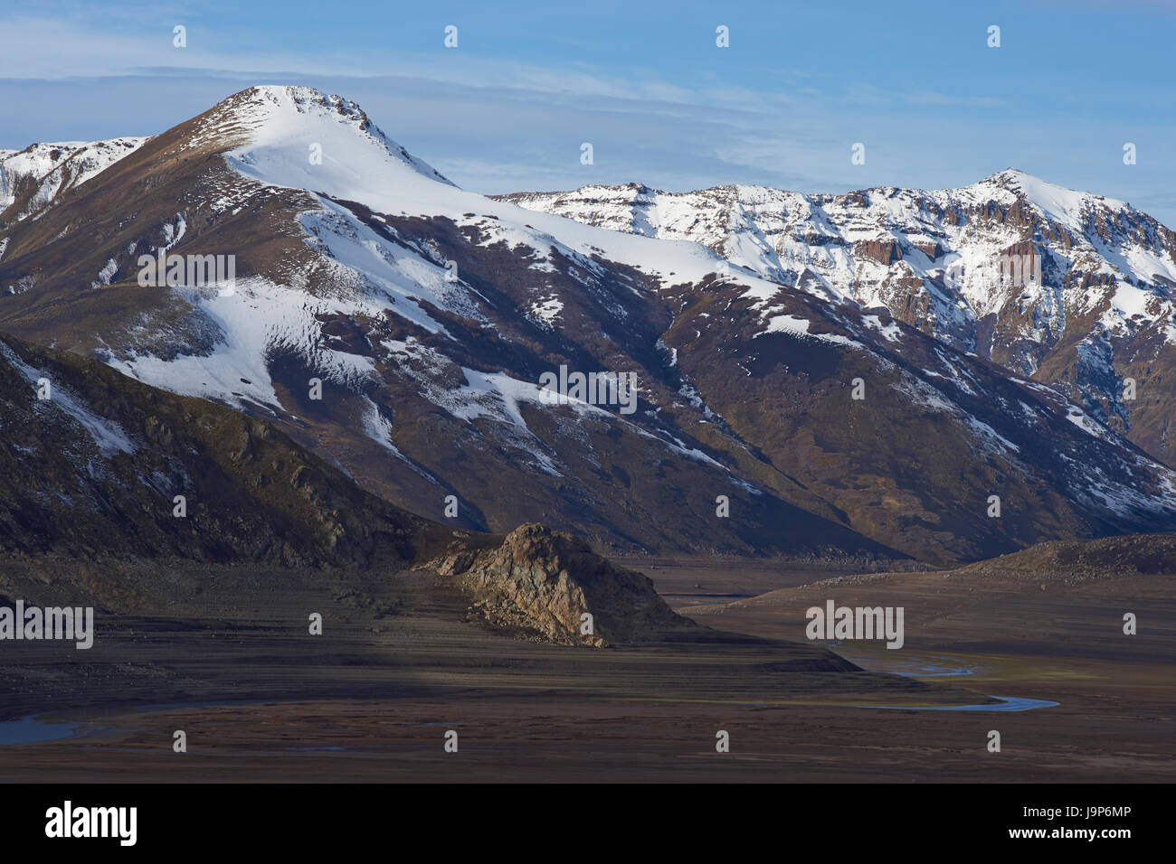 Volcanic plain, high in the mountains of Laguna de Laja National Park ...