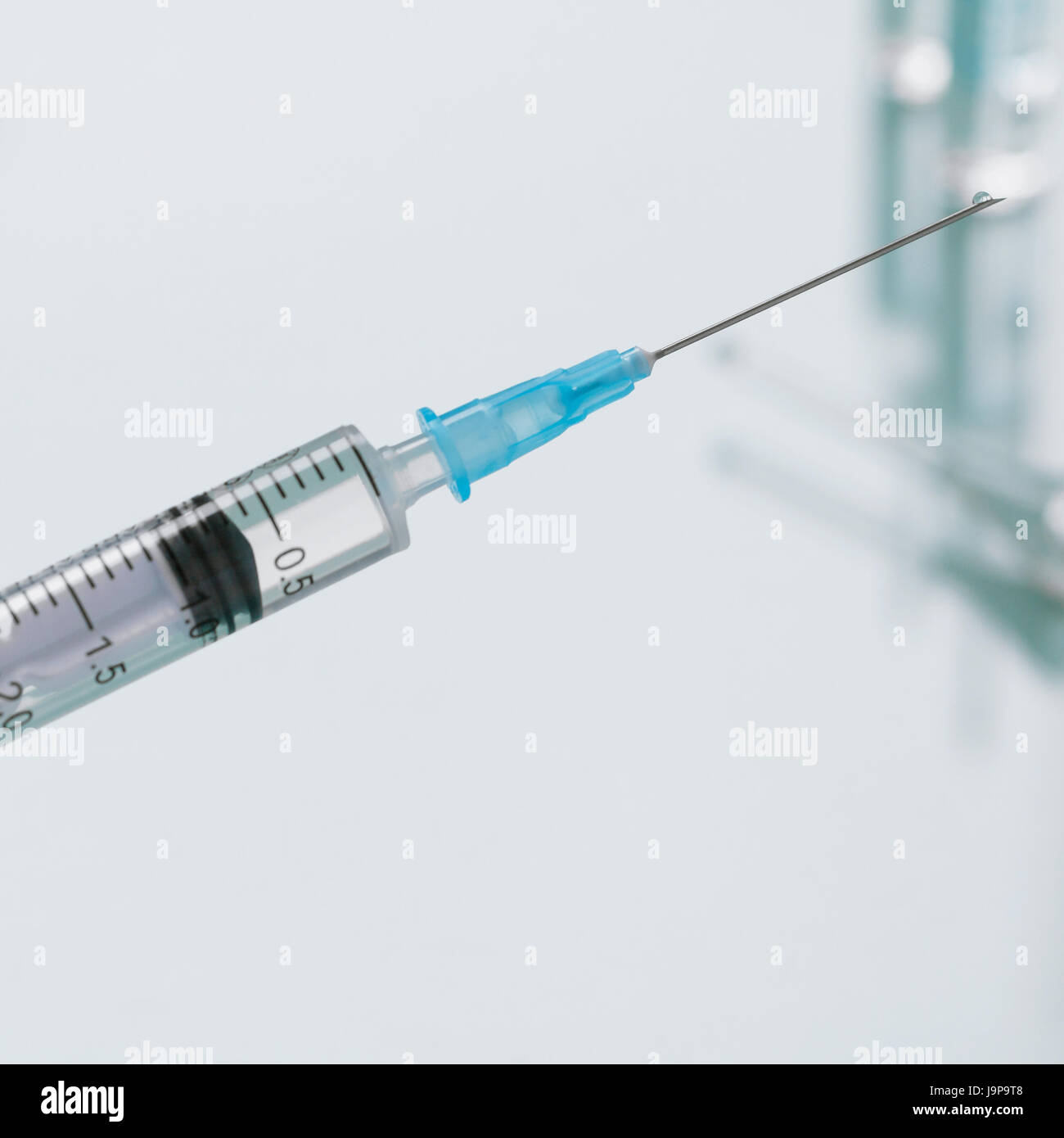 Close-up of syringe with a transparent injection Stock Photo - Alamy