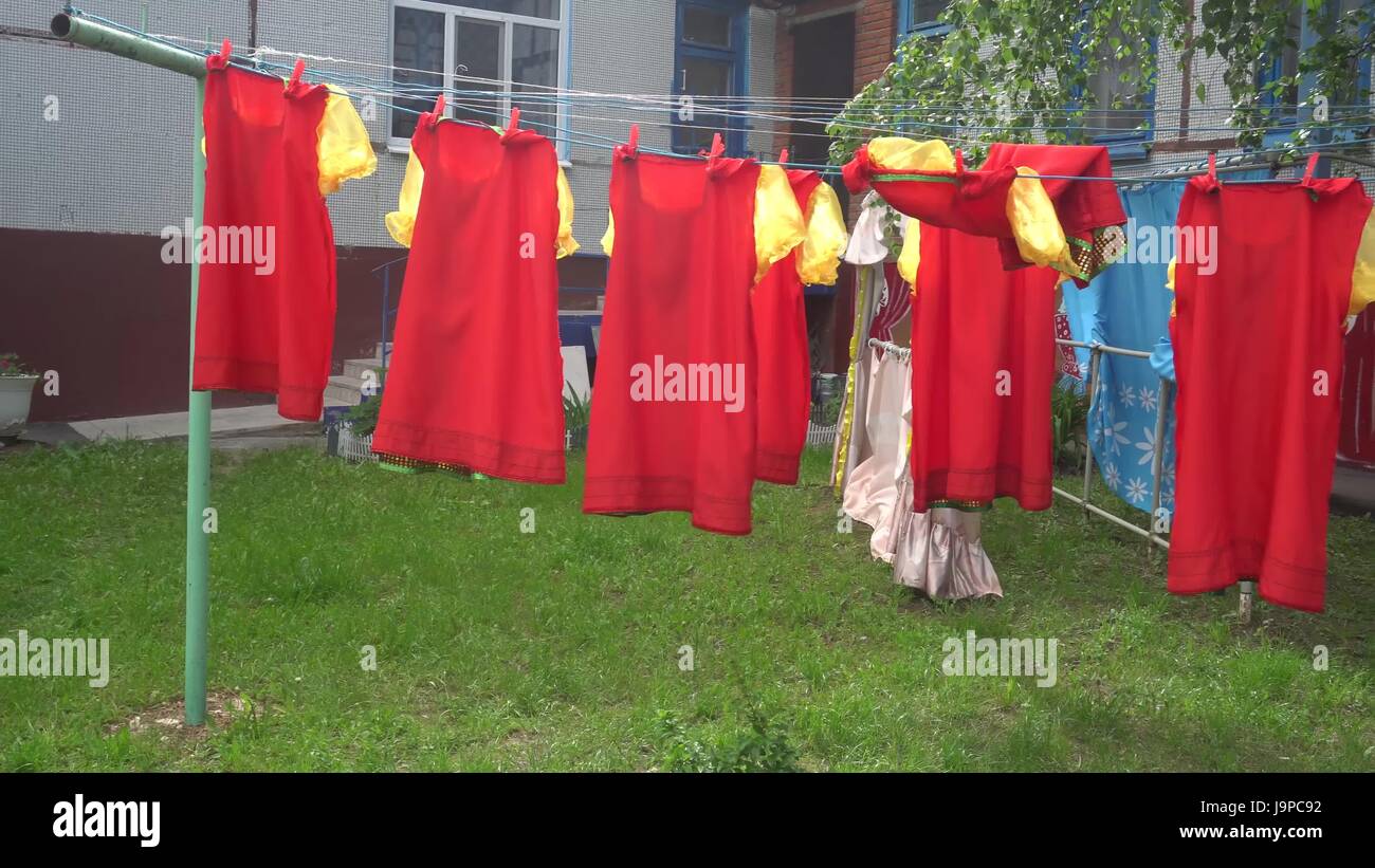 Drying clothes on ground hi-res stock photography and images - Alamy