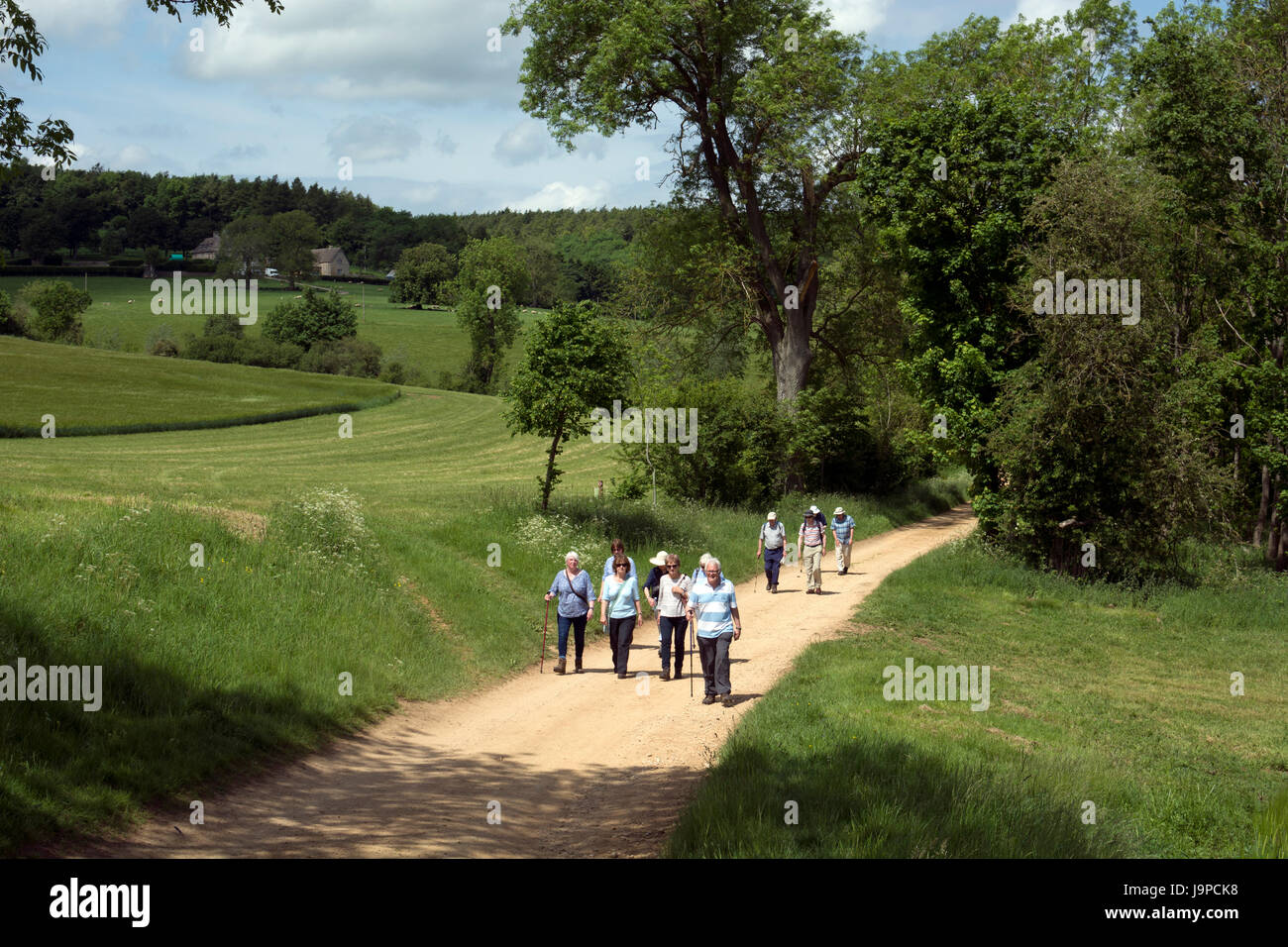 Group of people walking countryside hi-res stock photography and images ...