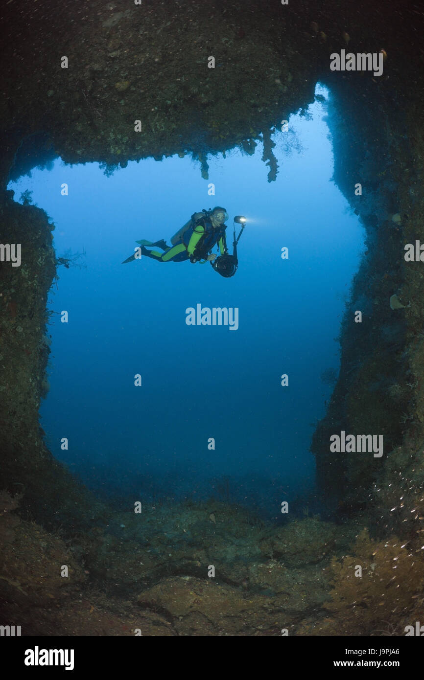 Diver in grotto,Raja Ampat,west Papua,Indonesia Stock Photo - Alamy