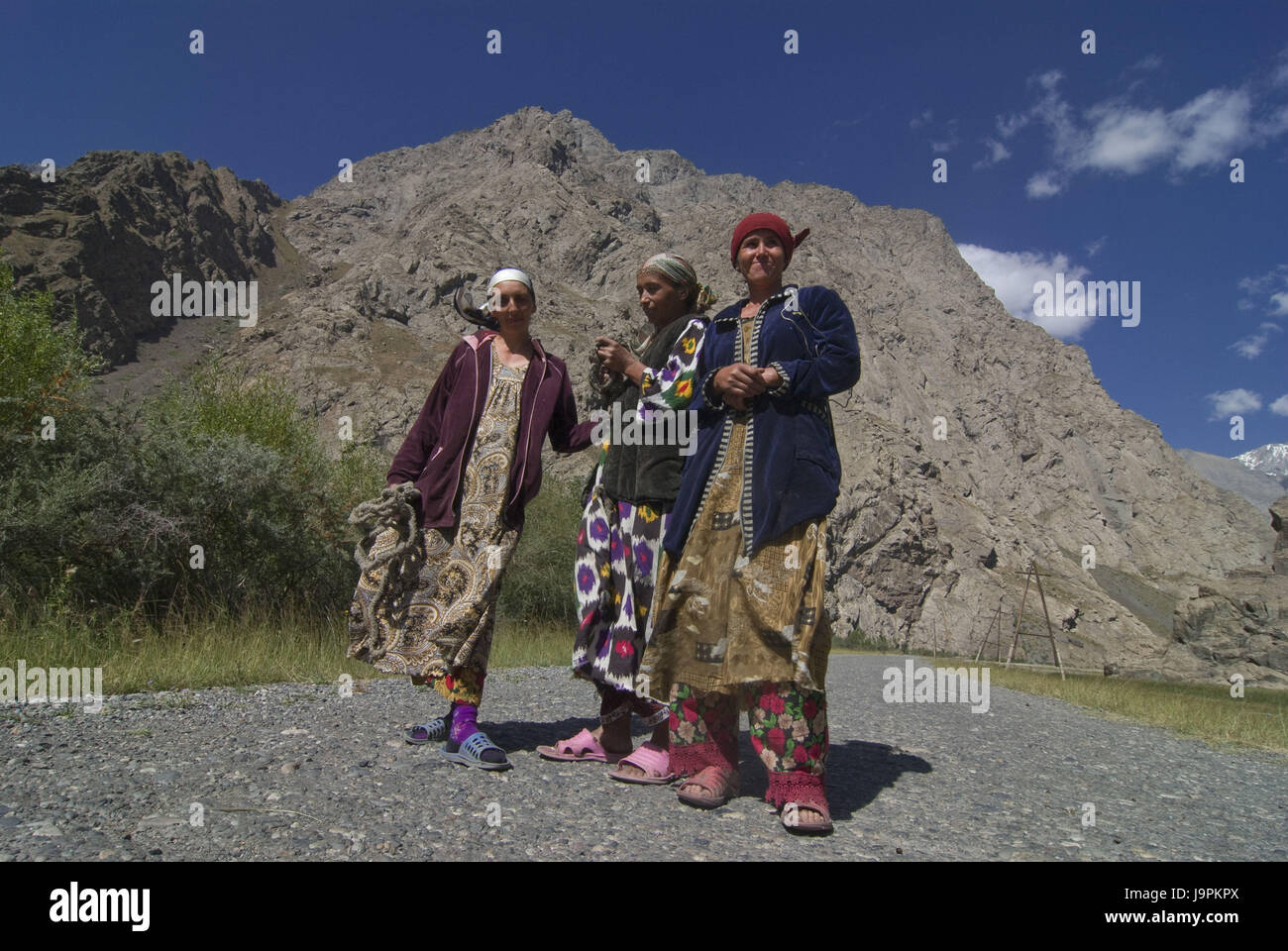 Three friendly farmers in the mountains,cash seaweed valley,the Pamir ...