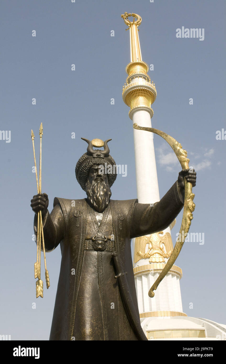 Statue with sword before the independence monument in Turkmenistan ...