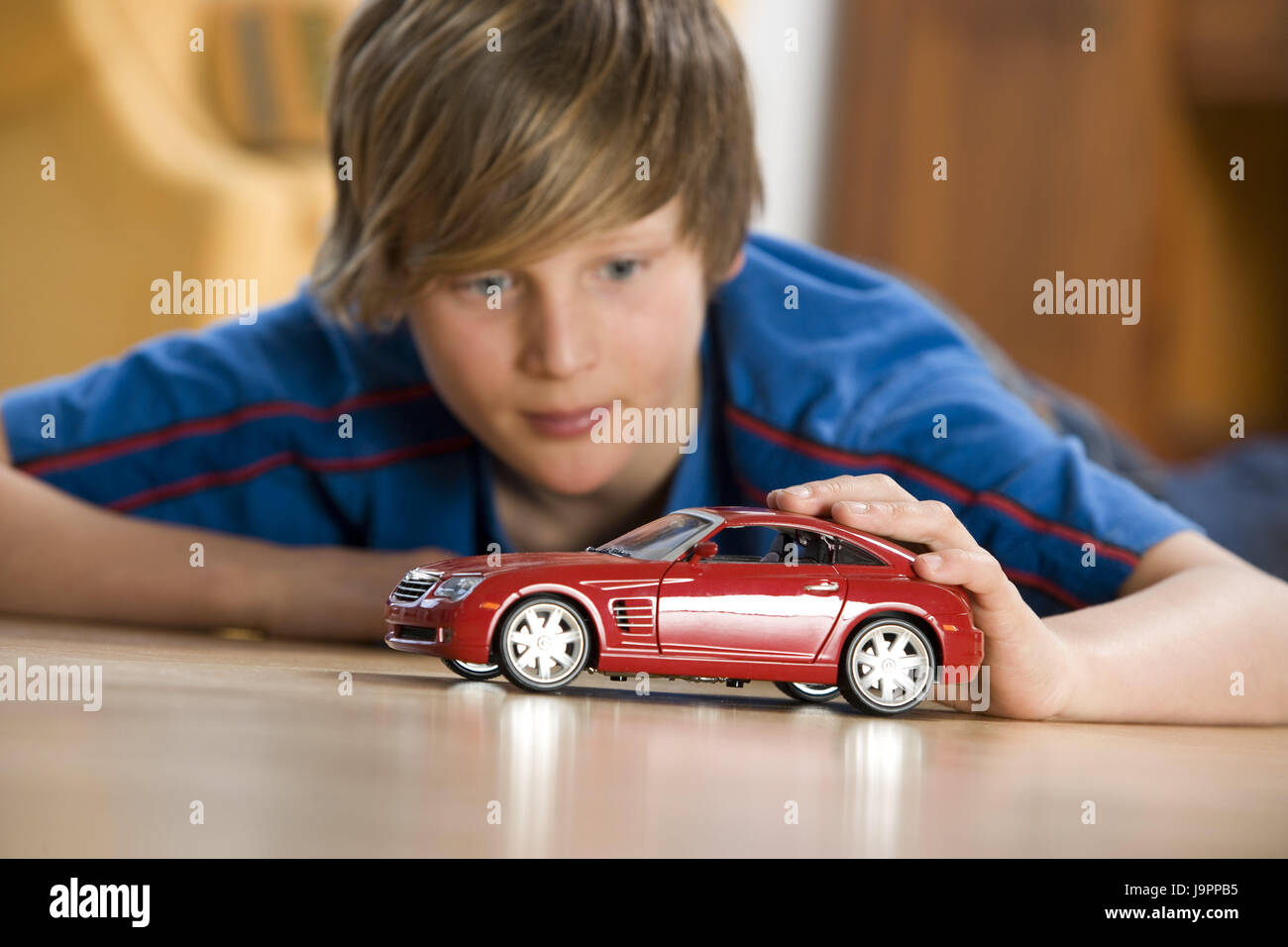 Boy,floor,model car,play,portrait,curled,blur,people,vehicle,toys car ...