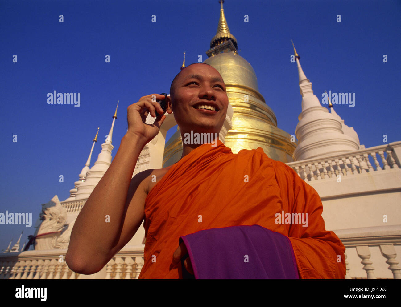 Buddhist monk phone hi-res stock photography and images - Alamy