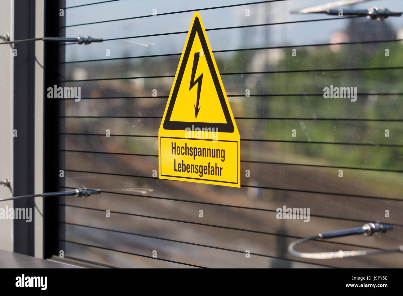 High tension high voltage line life danger sign warning hi-res stock ...