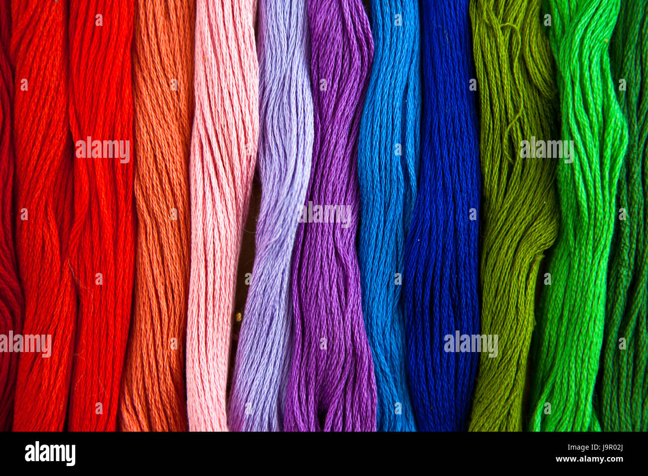 colorful embroidery thread Stock Photo - Alamy