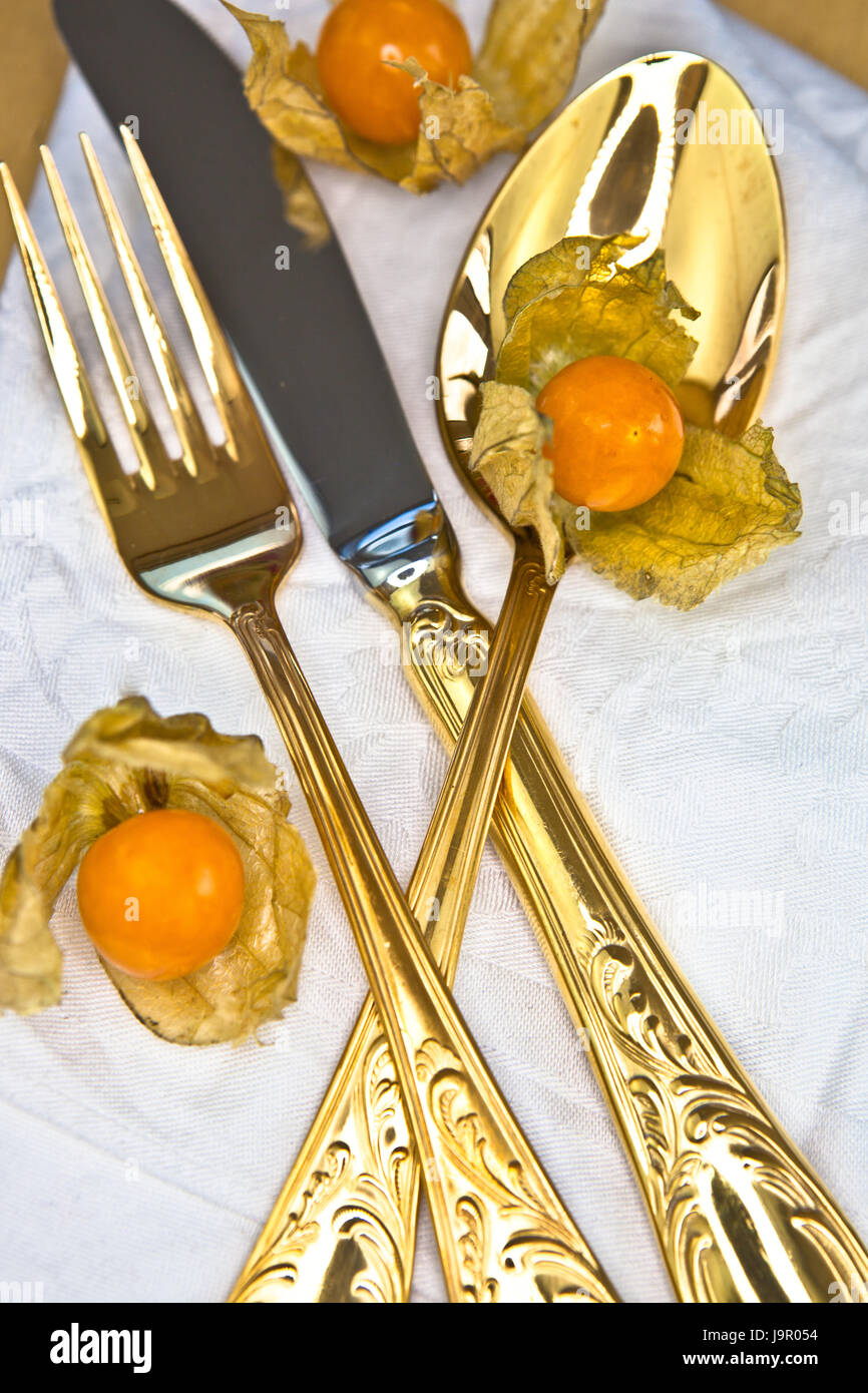 Cutlery golden spoon hi-res stock photography and images - Alamy