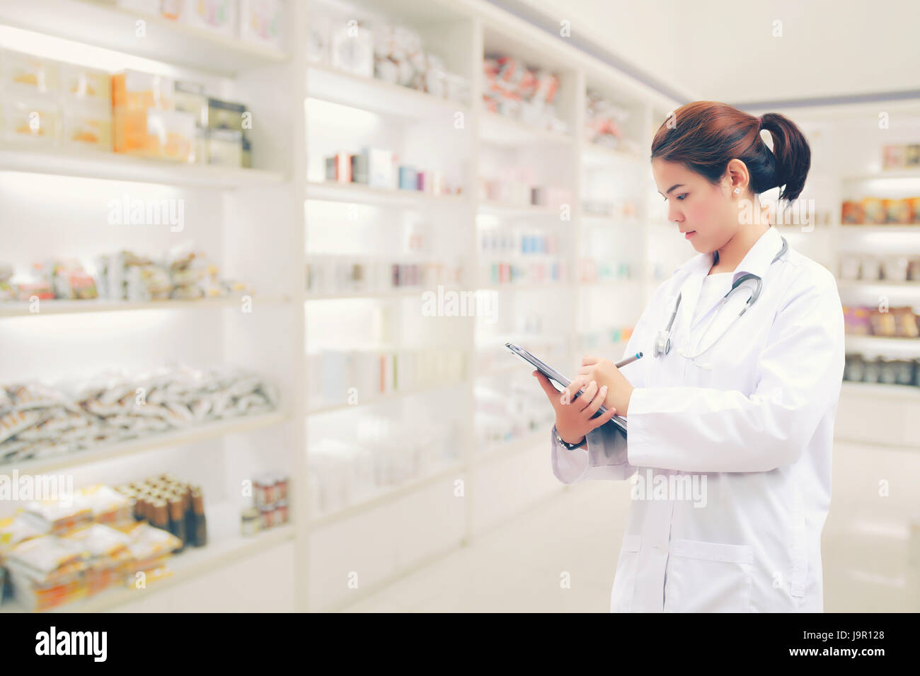 pharmacist chemist and medical doctor woman asia with stethoscope and ...