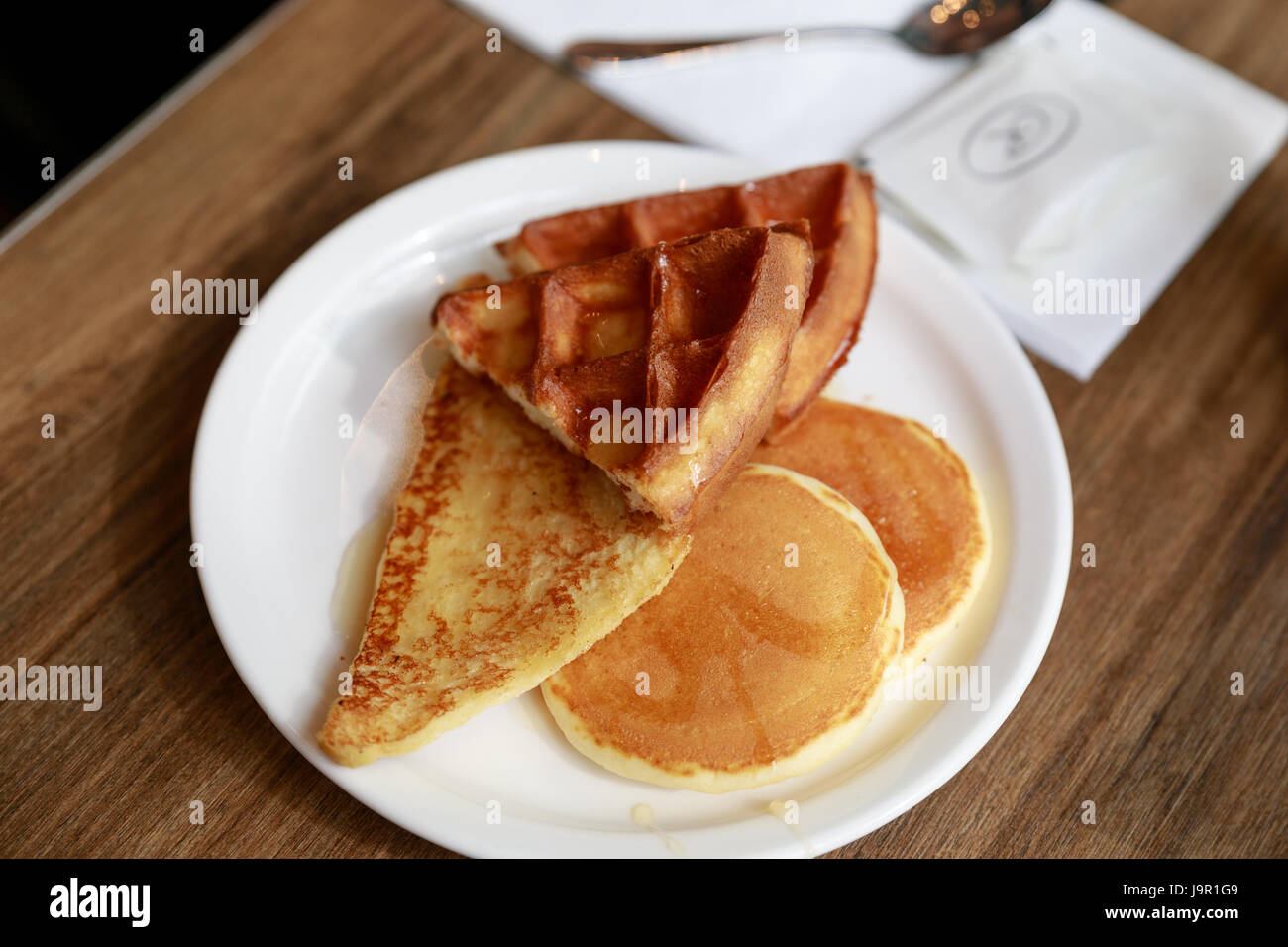 Dish of mixed breakfast - Waffle, Pancake Stock Photo - Alamy